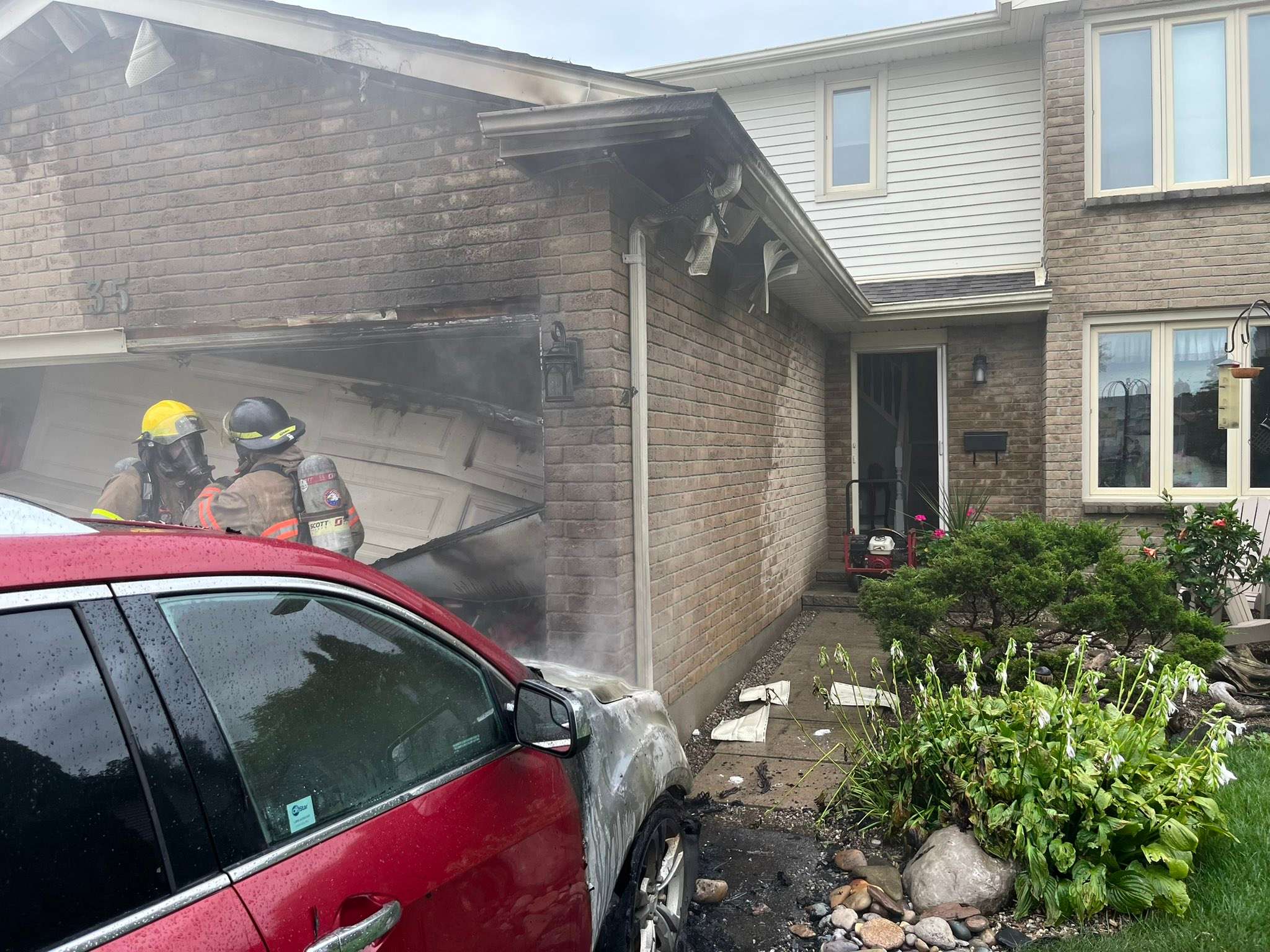 Vehicle fire spreads to northwest London home