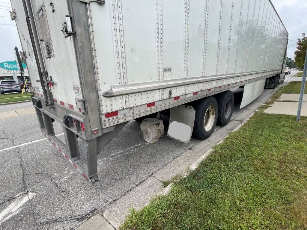Armour stones dragged along Cathcart Blvd. after collision