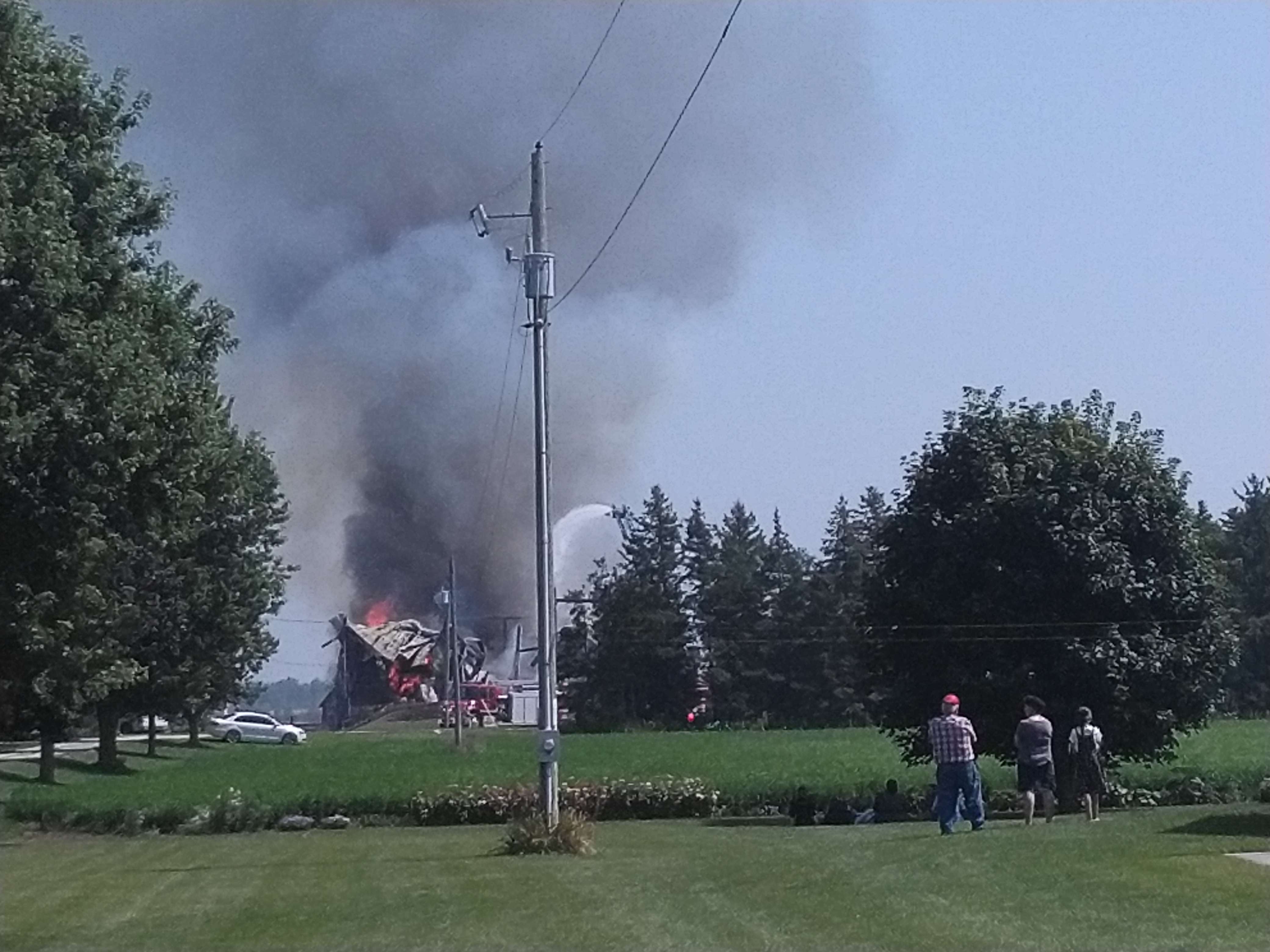 Perth East firefighters battle structure fire near Newton