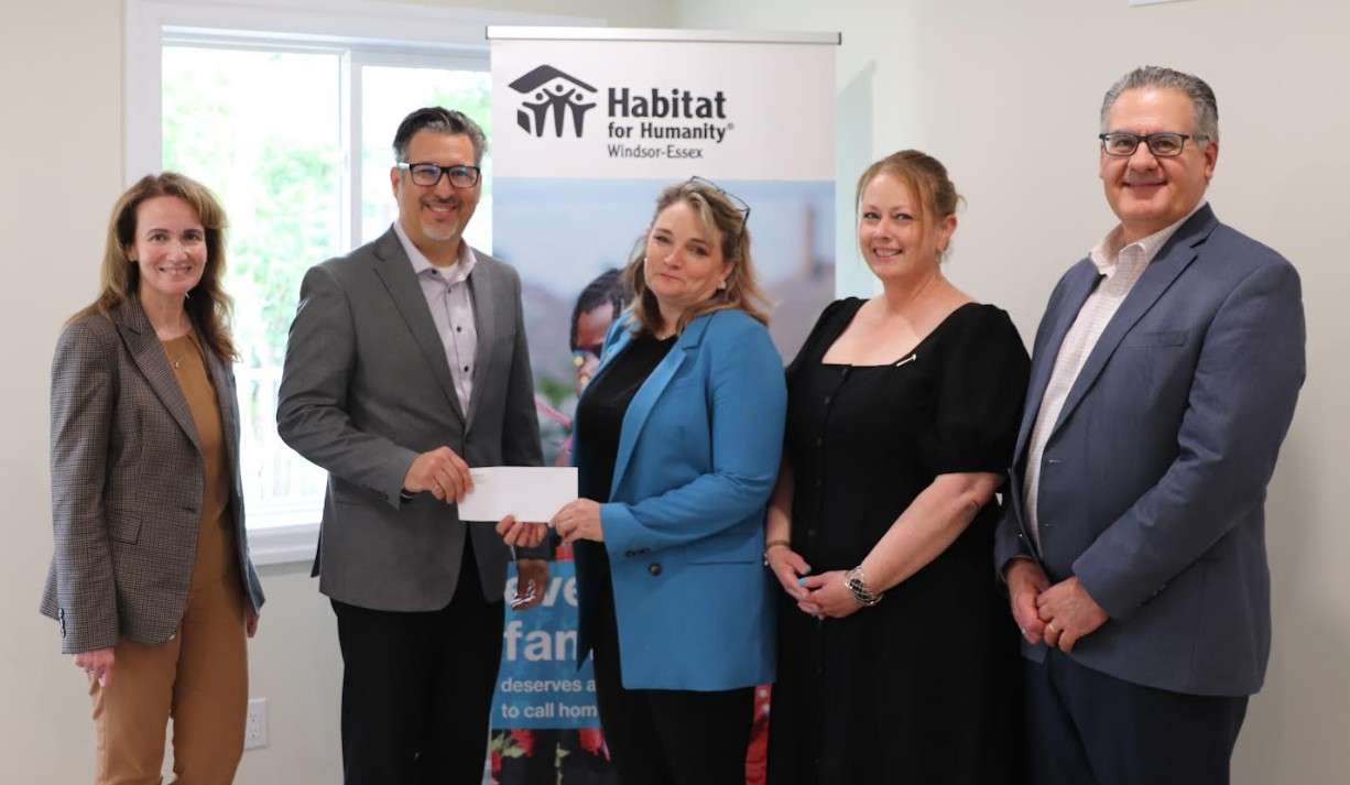 ENWIN donates award money to Habitat for Humanity